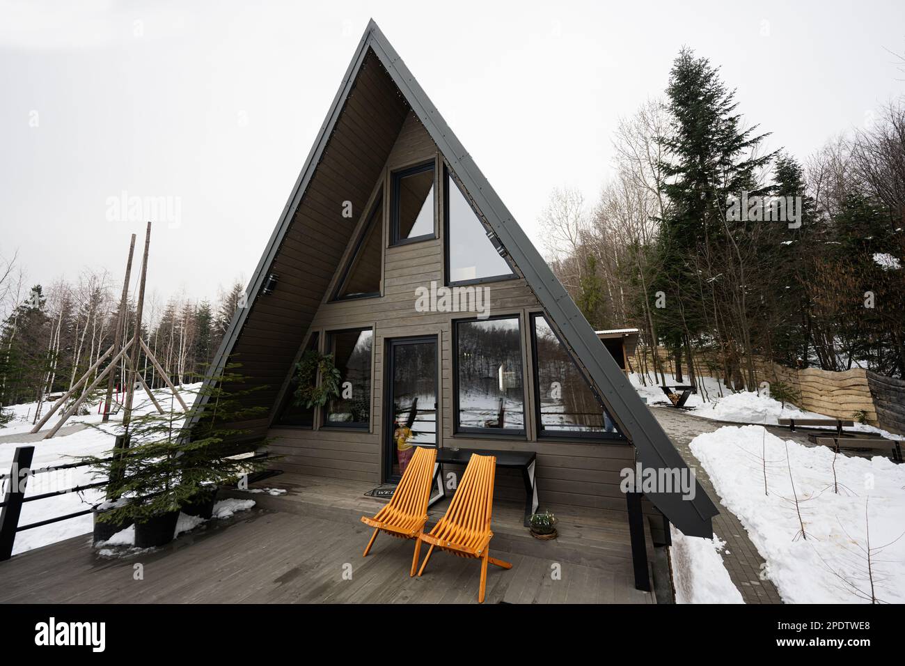 Terrace of wooden triangle country tiny cabin house in mountains and ...