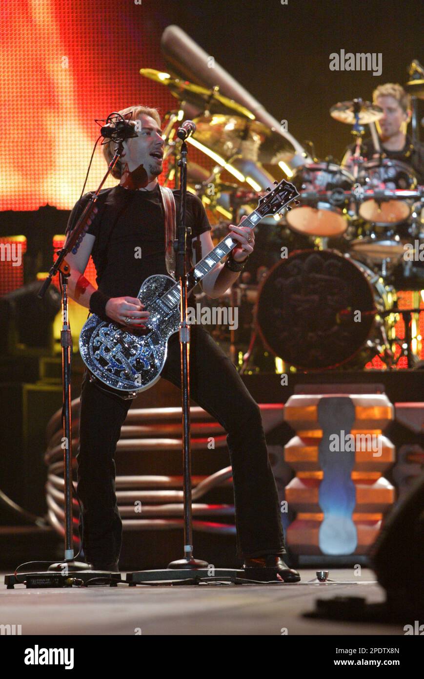 Chad Kroeger Nickelback performing live in concert at the Acer Arena ...