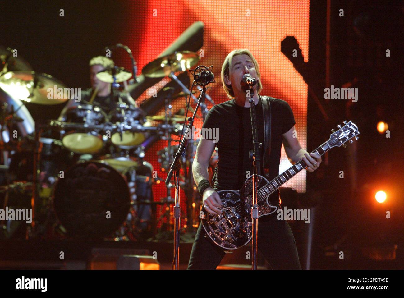 Chad Kroeger Nickelback performing live in concert at the Acer Arena ...