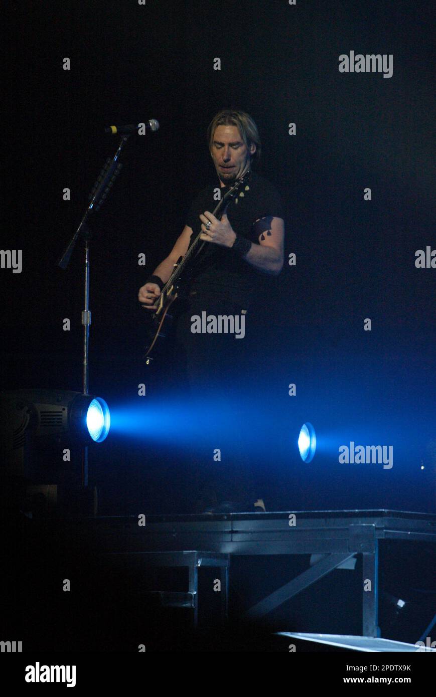 Chad Kroeger Nickelback performing live in concert at the Acer Arena ...