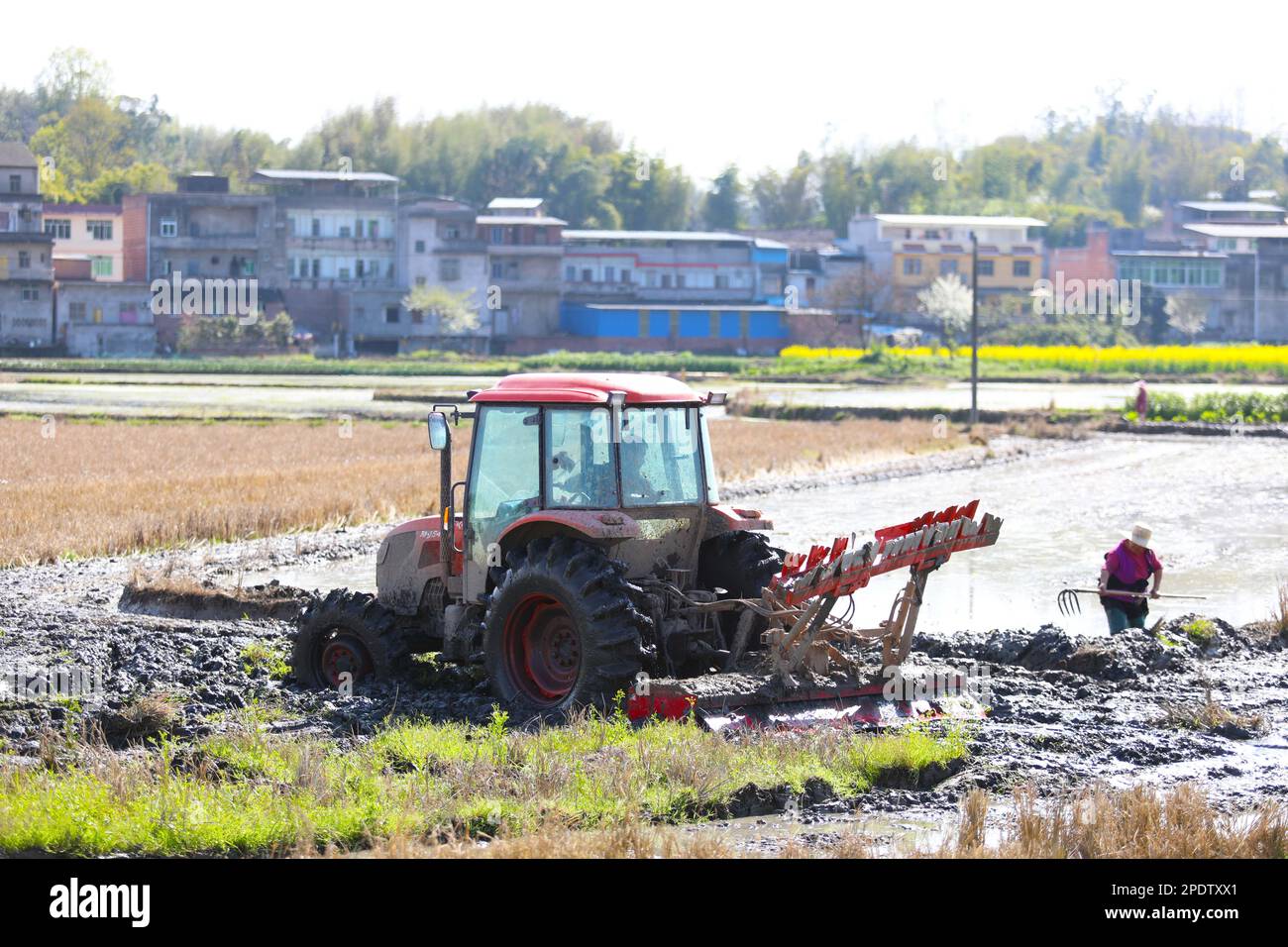 CHONGQING, CHINA - MARCH 14, 2023 - Workers drive machines to help ...