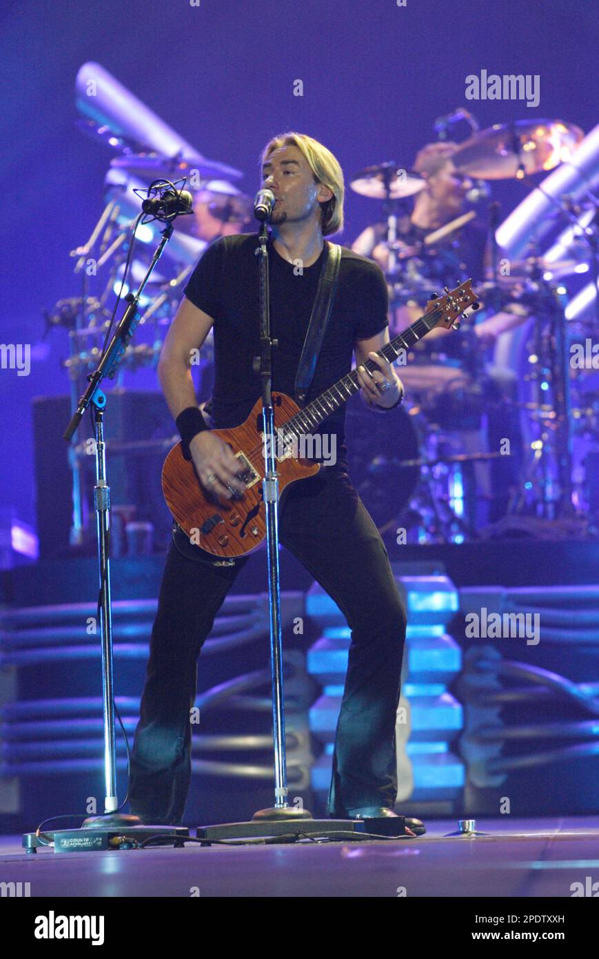 Chad Kroeger Nickelback performing live in concert at the Acer Arena ...