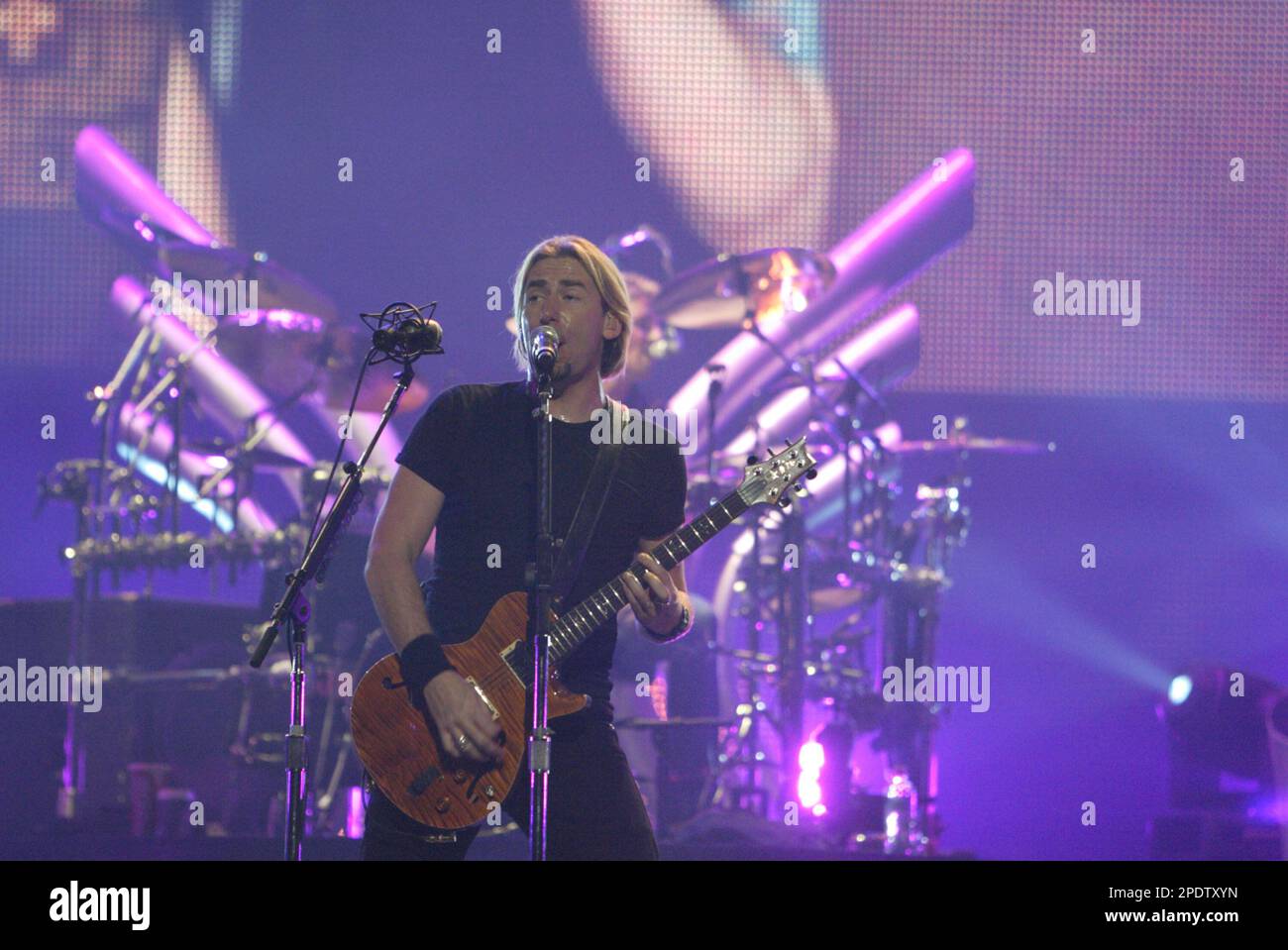 Chad Kroeger Nickelback performing live in concert at the Acer Arena ...