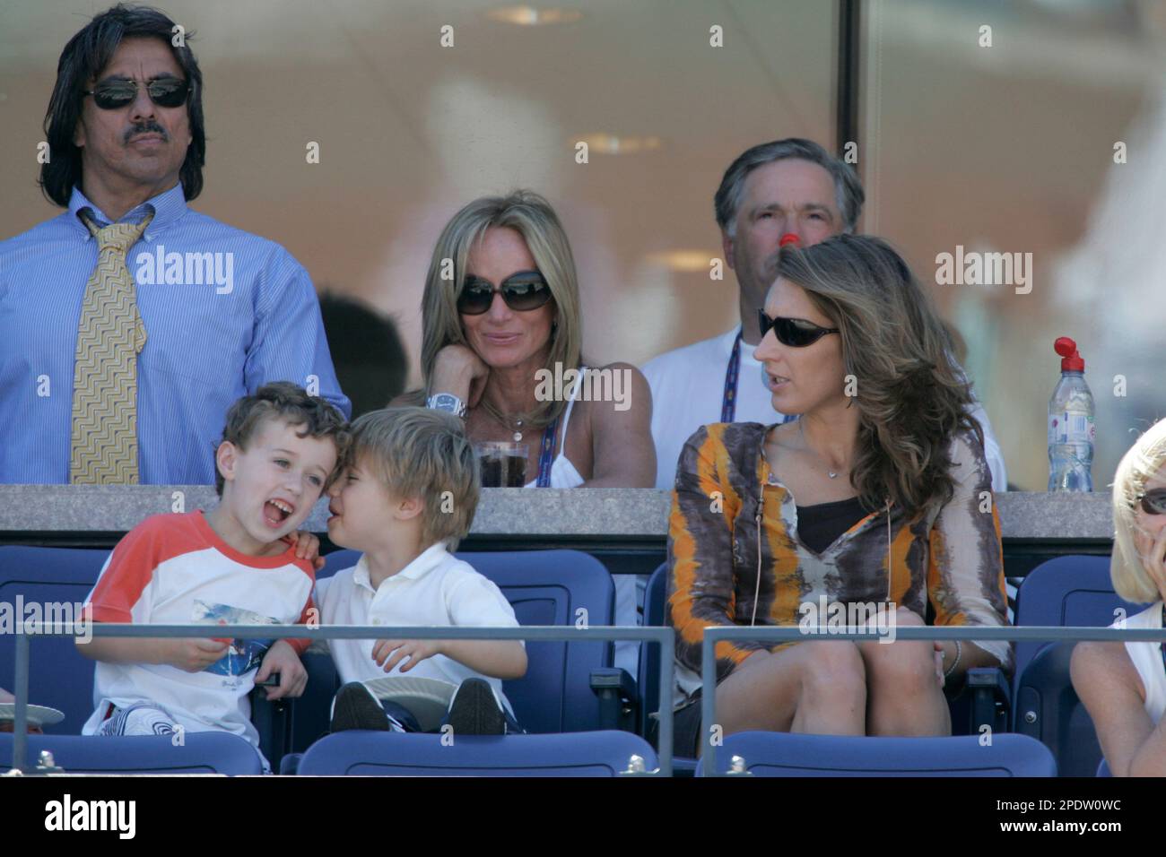Steffi Graf watches her son, Jaden Gil, center, play with another child ...