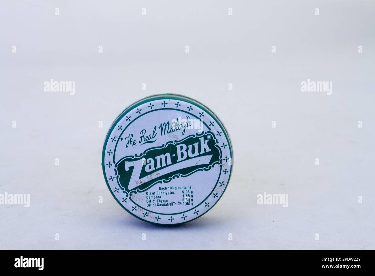 A tin of Zam-Buk ointment isolated on a clear background with copy ...