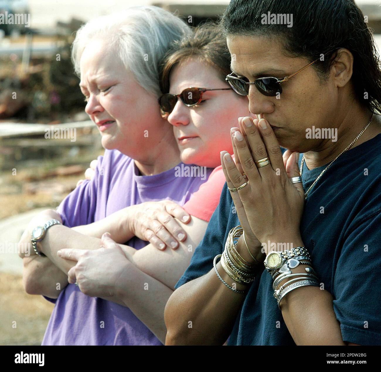 Biloxi residents, Myra Craft, Stephanie Craft and Lisa Hatch, from left ...