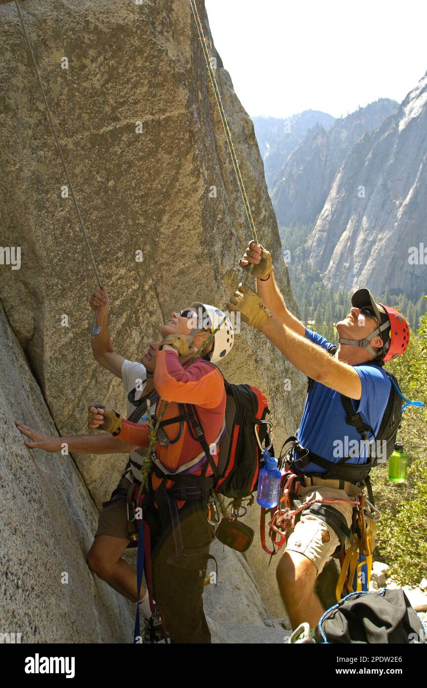 Kelly Perkins, left, begins her ascent of the sheer, nearly 3,000-foot ...
