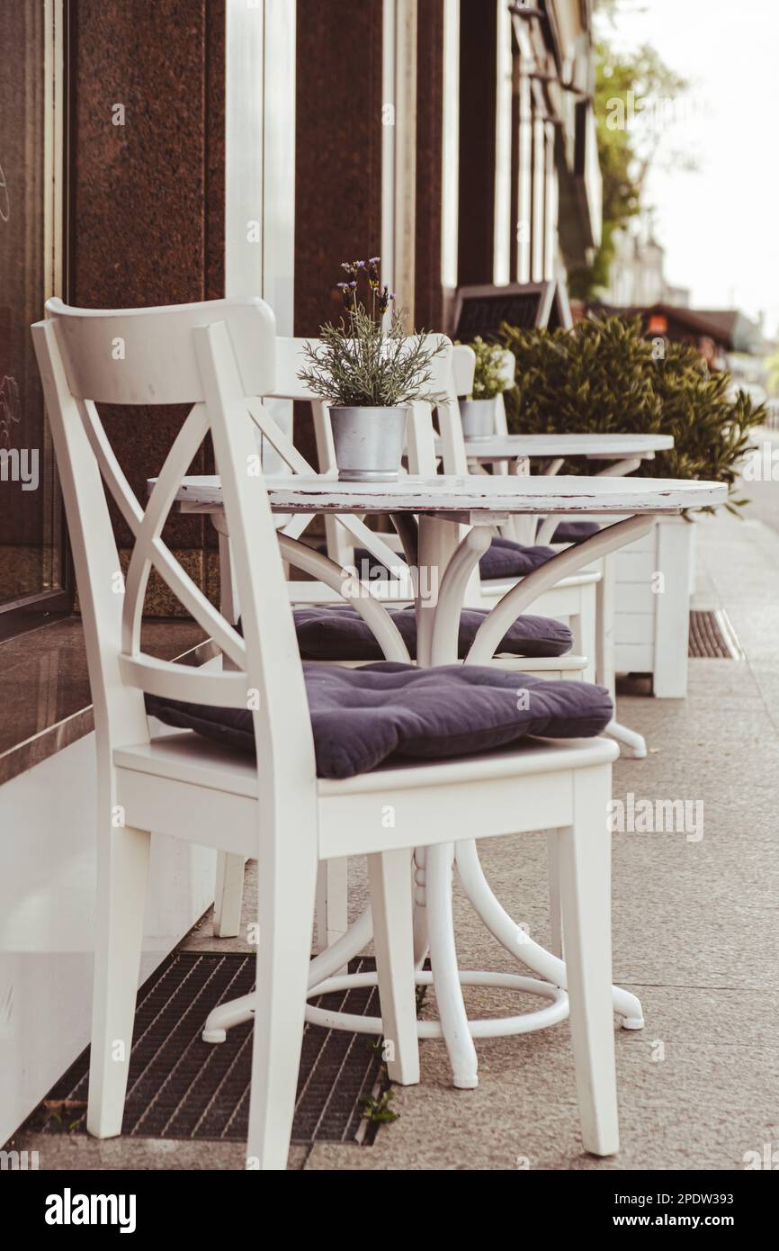 Outdoor table in street cafe. Outdoor empty coffee and restaurant ...