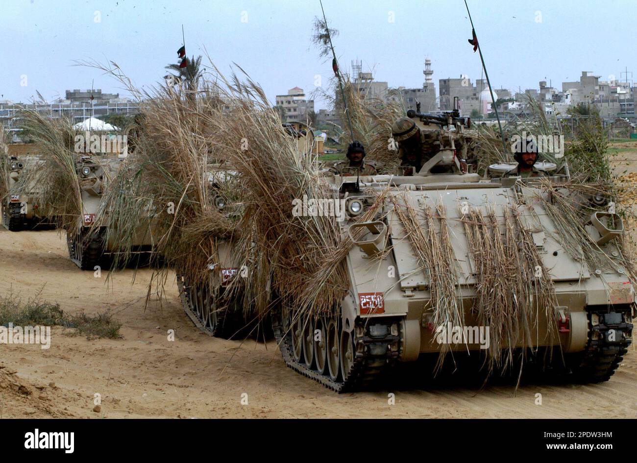 Armored vehicles of the Pakistan army roll out during a rehearsal for ...