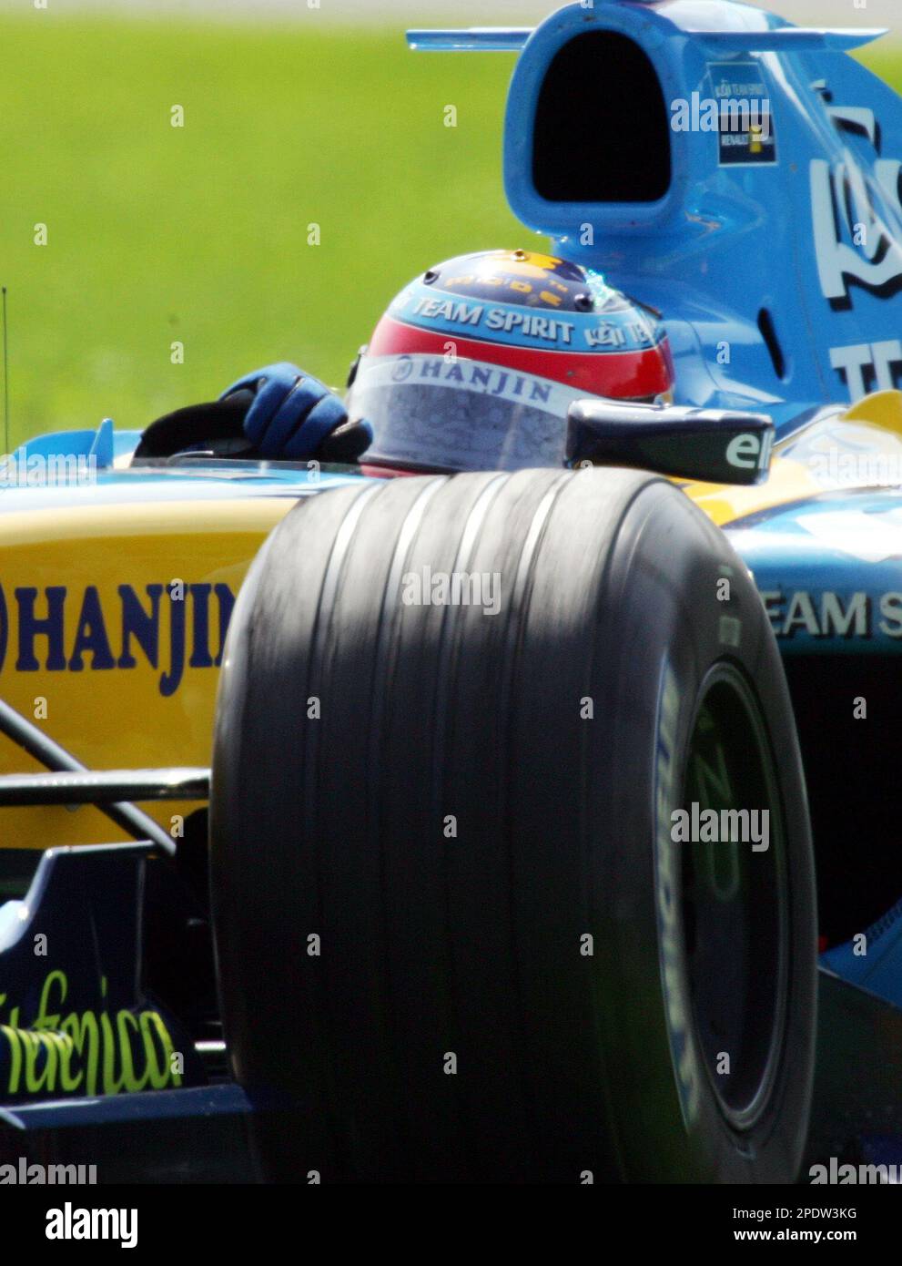 Fernando Alonso of Spain steers his Renault during the F1 Grand Prix of ...