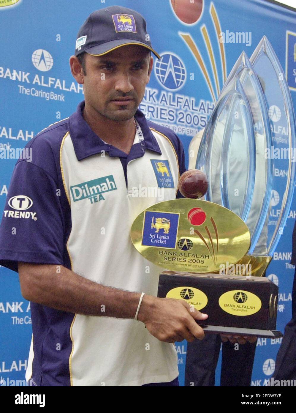 Sri Lankan captain Marvan Atapattu poses with the Bank Alfalah trophy ...