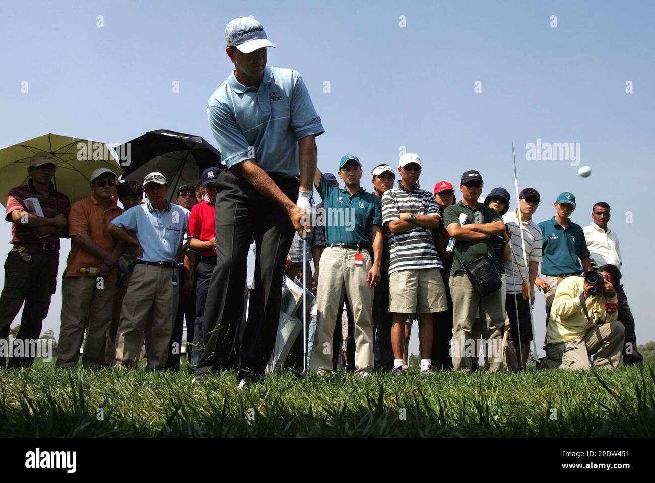 South Africa's Retief Goosen chips to the green on the final day of the ...