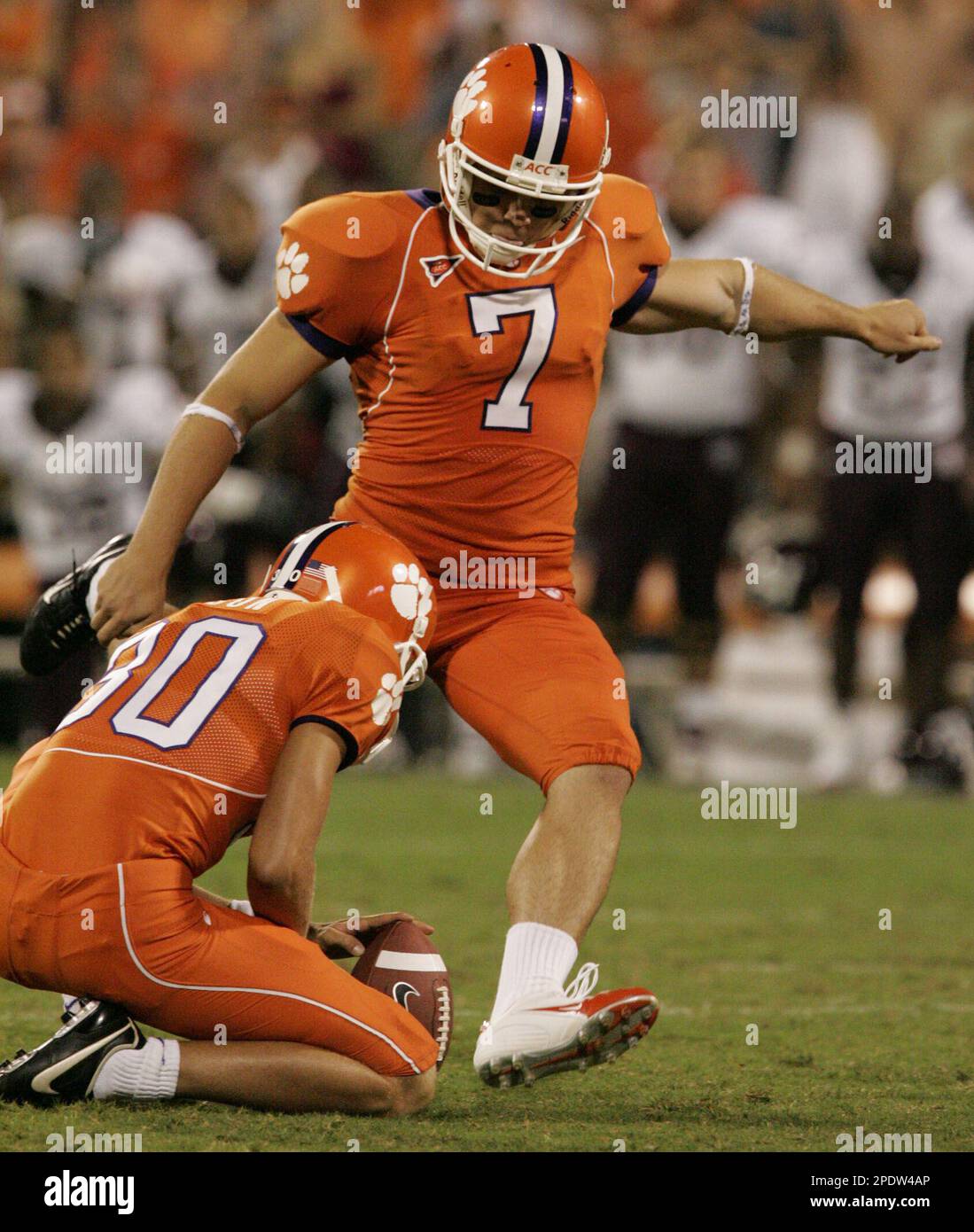 Clemson's Jad Dean (7) kicks a 42-yard winning field goal as Cole ...