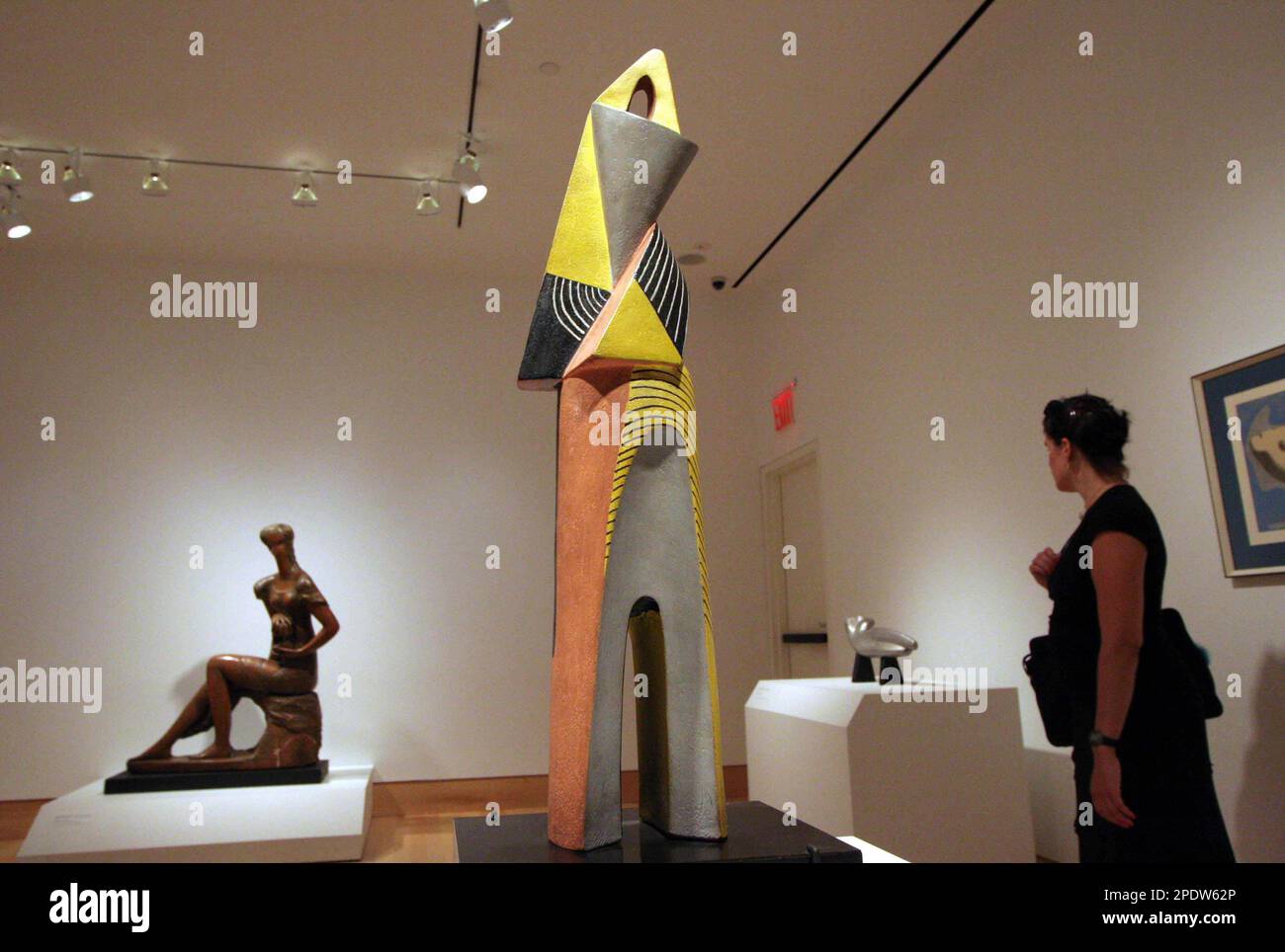 "Architectural Figure," center, is part of an exhibit by the late ...