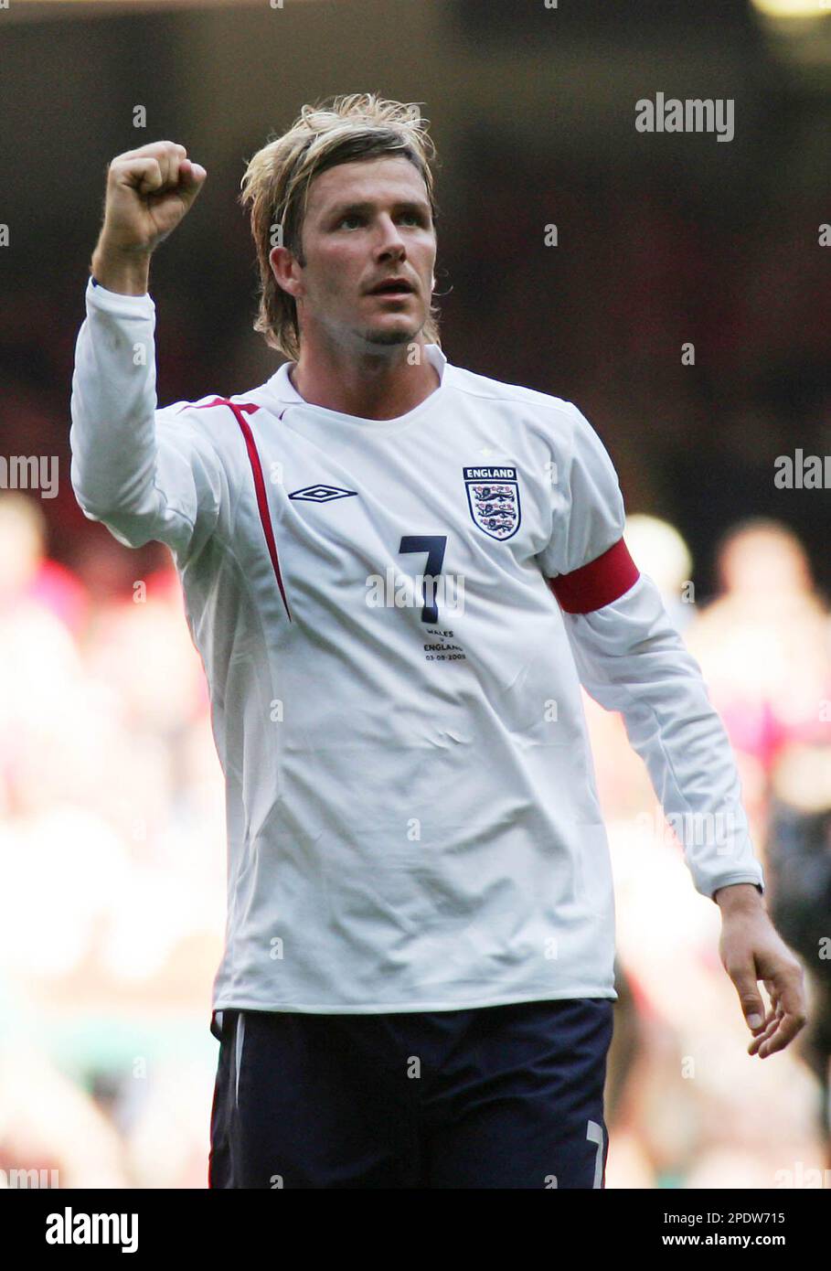 England's captain David Beckham celebrates beating Wales 1-0 in their ...