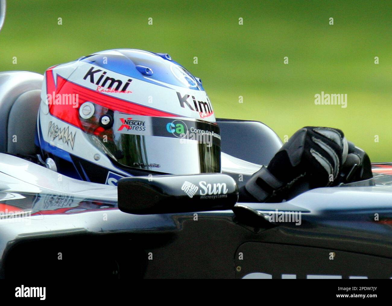 Kimi Raikkonen of Finland steers his F1 McLaren-Mercedes during free ...