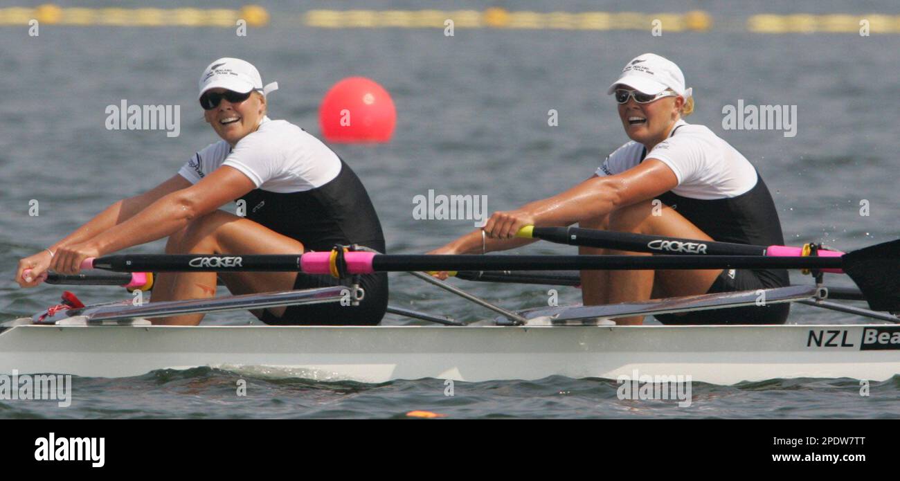 New Zealand's Caroline, left, and Georgina Evers-Swindell react after ...