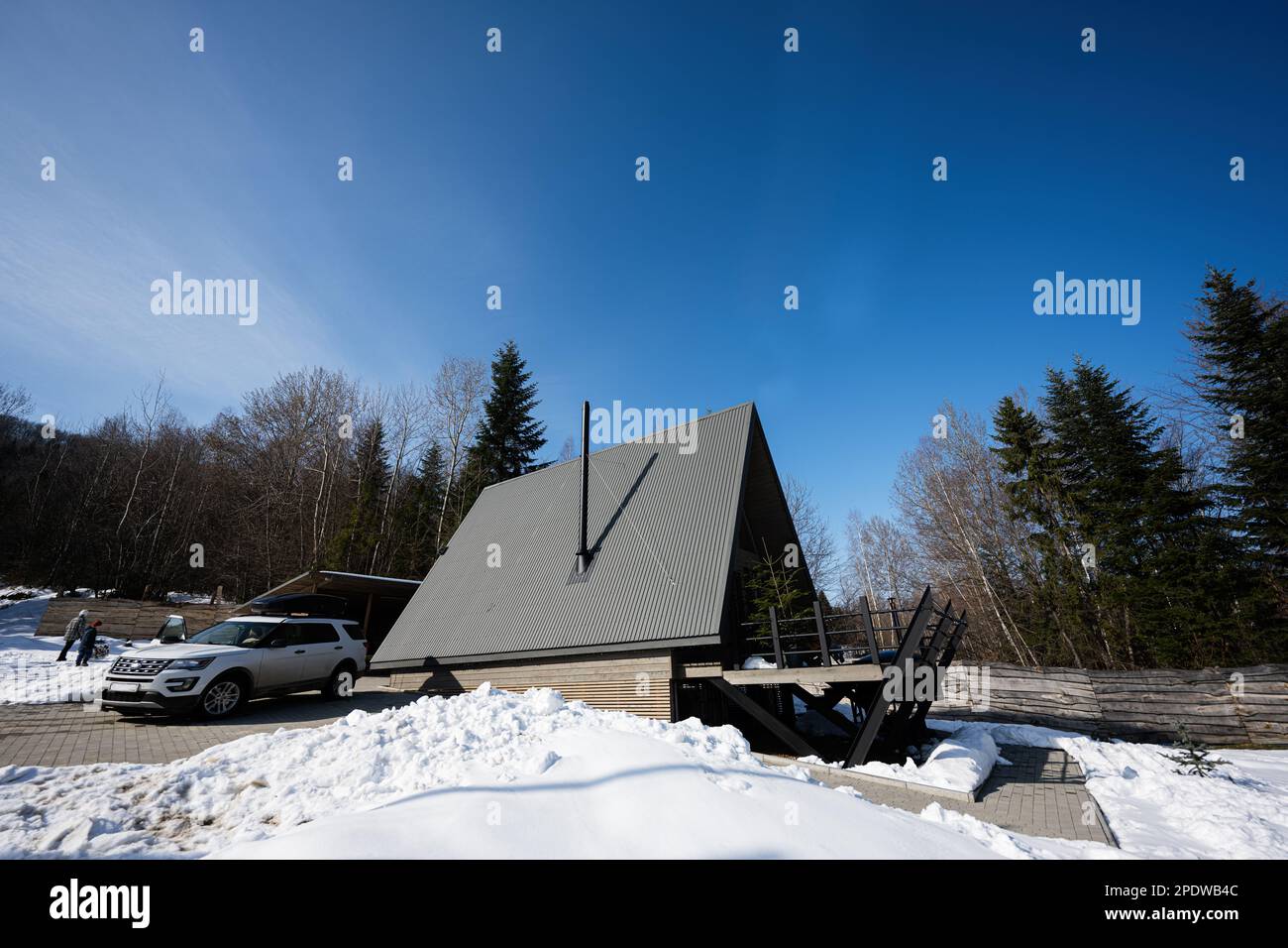 Triangle country tiny cabin house and suv car with roof rack in ...