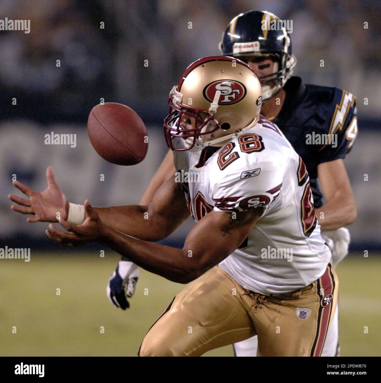 San Francisco 49ers safety Keith Lewis pulls in an interception as San ...