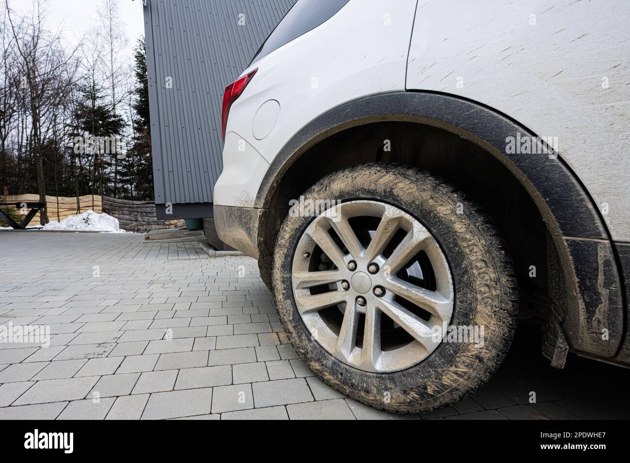 Close up mud dirty wheel of off road SUV car. Adventure in mountains ...