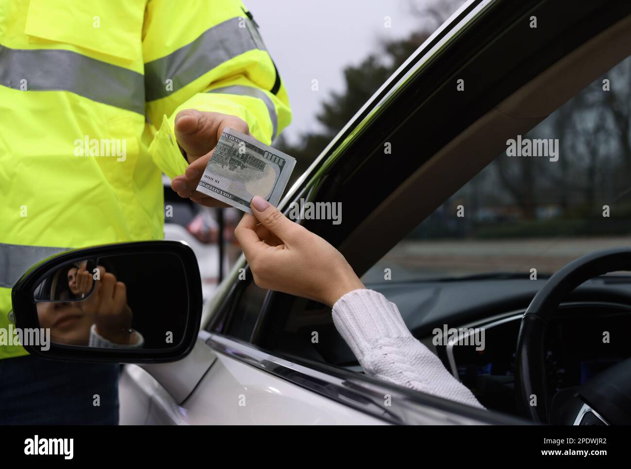 Female driver hands police officer hi-res stock photography and images ...