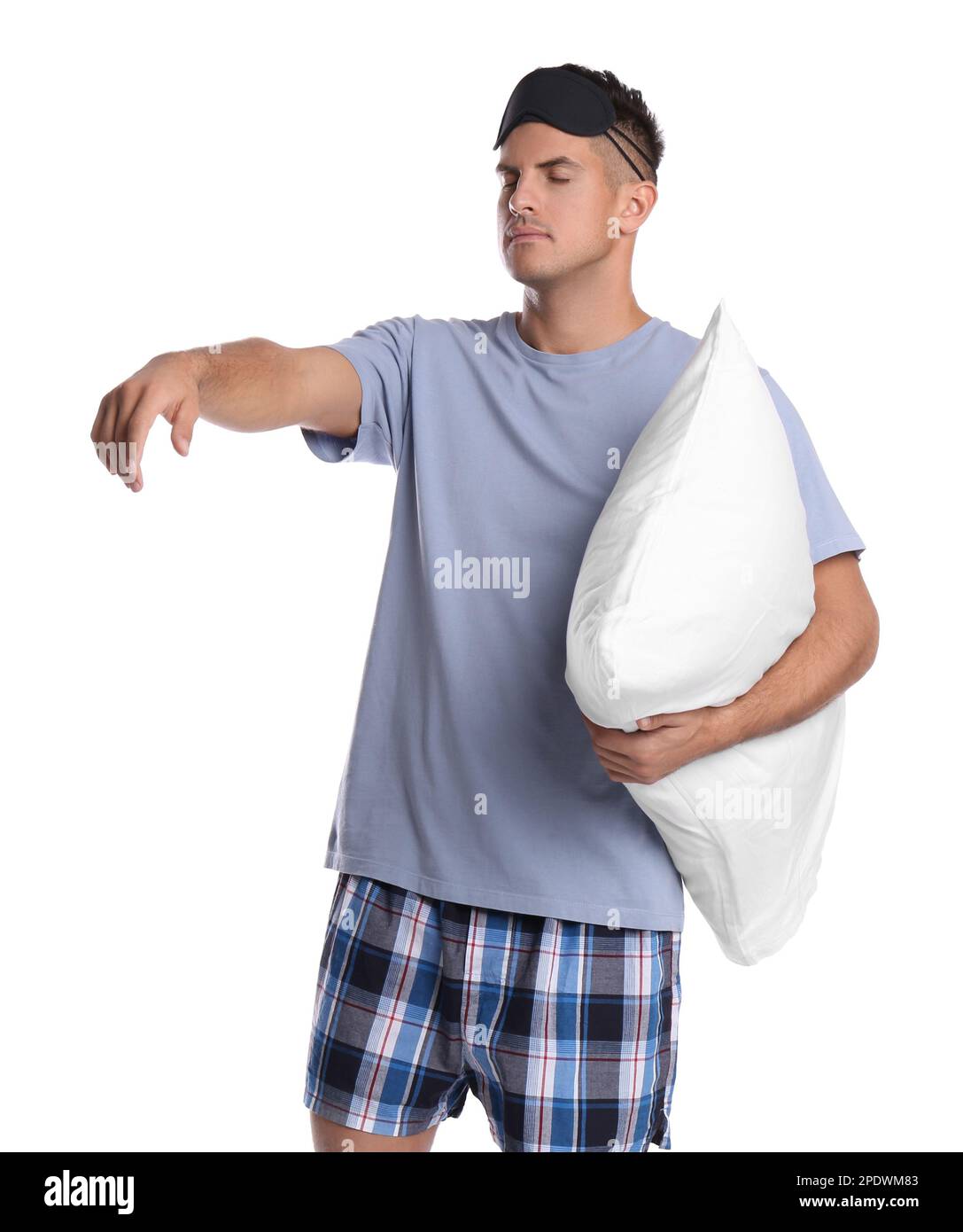 Somnambulist with blindfold and soft pillow on white background ...