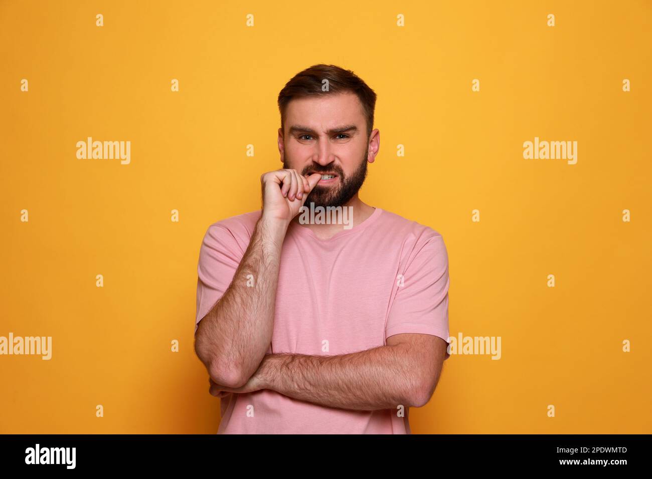 Frustrated man biting on hi-res stock photography and images - Alamy