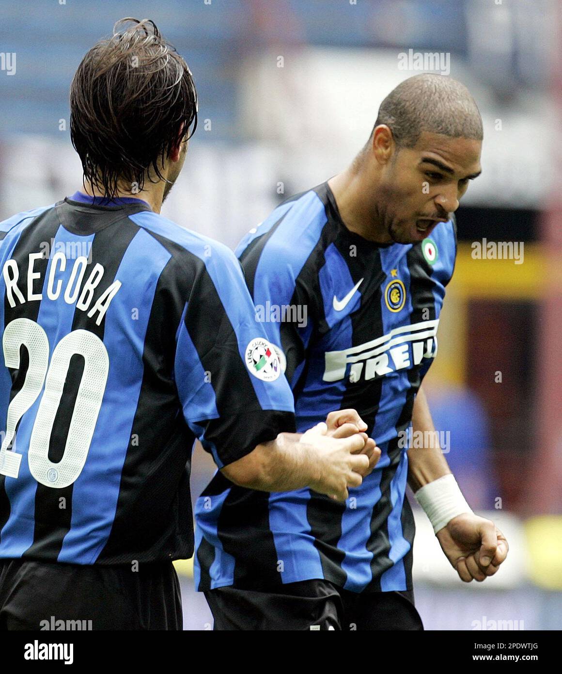 Inter of Milan forward Adriano, right, of Brazil, celebrates with his ...