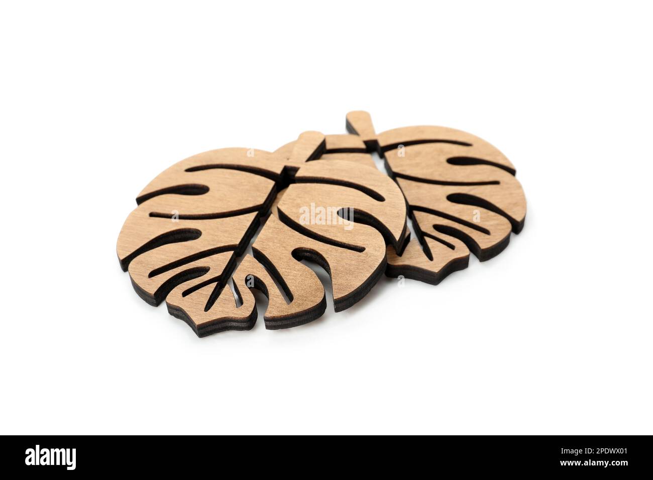 Leaf shaped wooden cup coasters on white background Stock Photo - Alamy