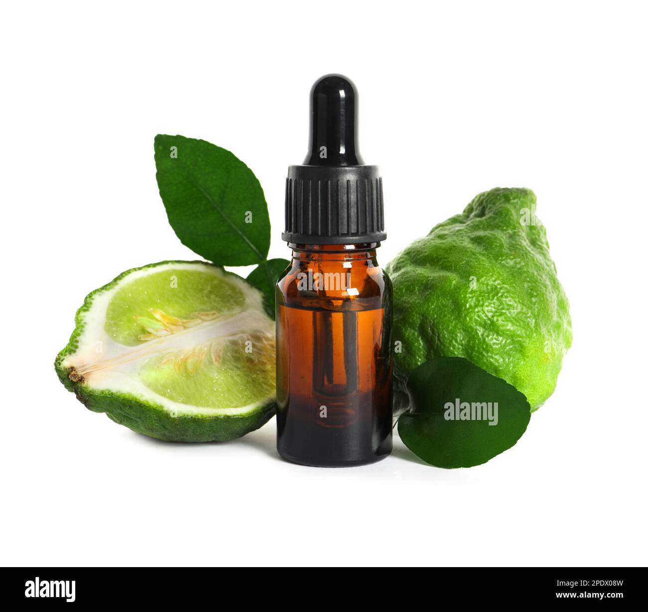 Bottle of essential oil, fresh bergamot fruits and leaves on white ...
