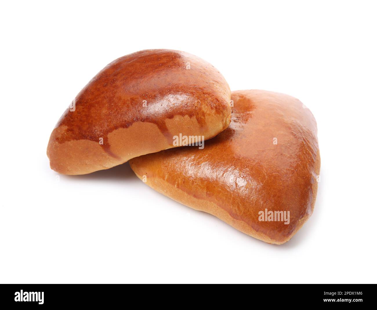 Baked pirozhki on white background. Delicious pastry Stock Photo - Alamy