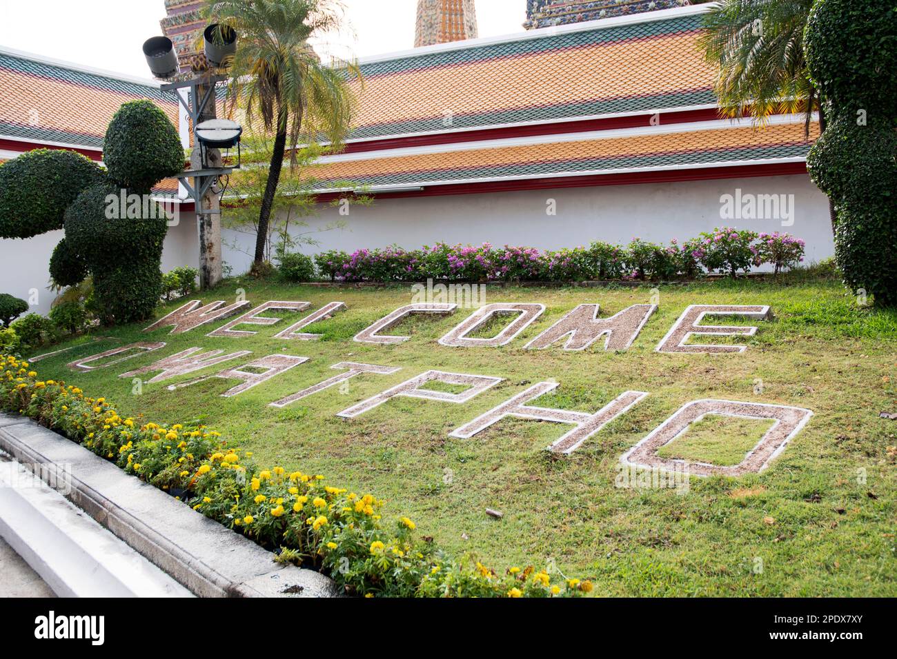 Wat Pho word arranged on the green grass field inside Wat Pho. Wat Phot ...