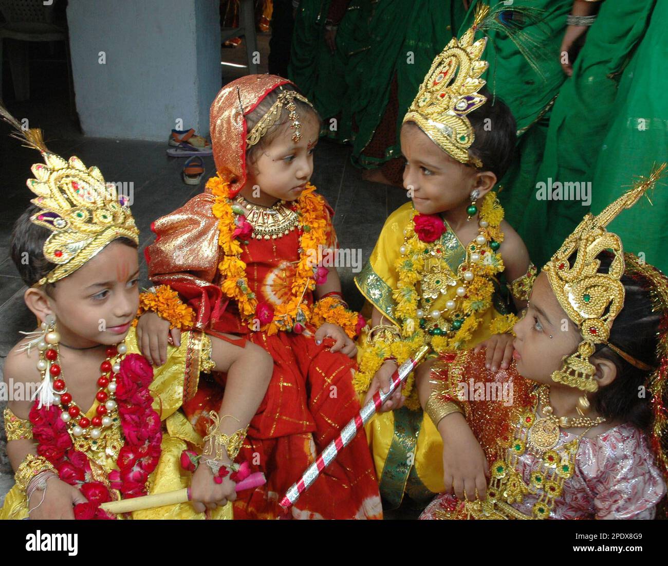 School children wait for their turn to perform a play on the life of ...