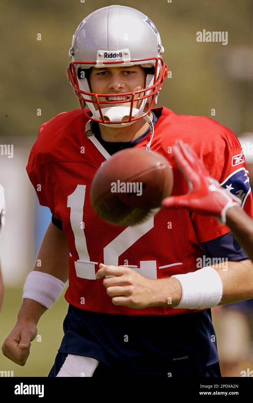New England Patriots starting quarterback Tom Brady (12) has a ball ...