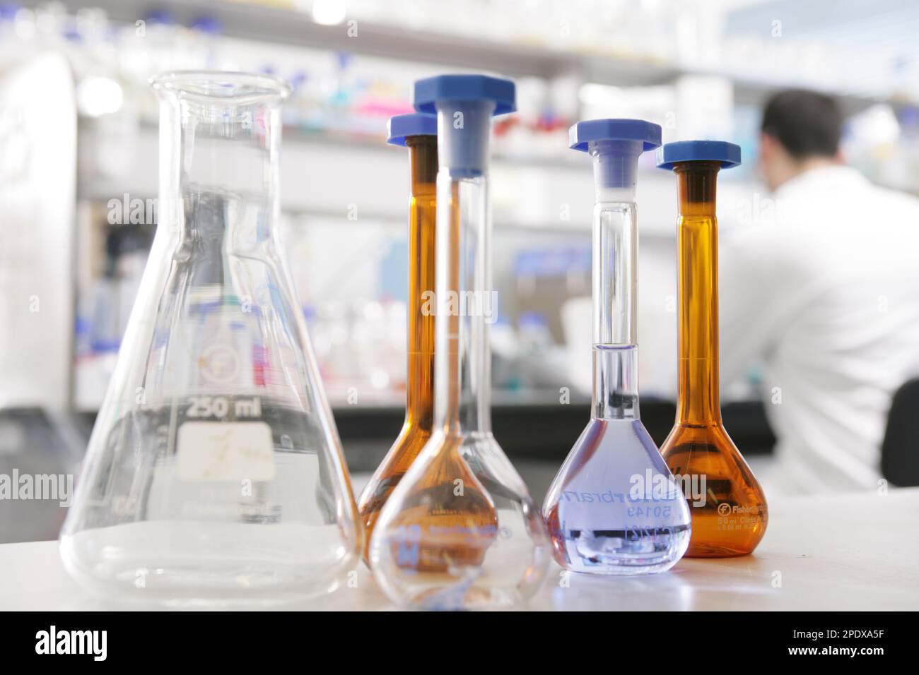 Coloured liquid in test tubes in a laboratory Stock Photo - Alamy