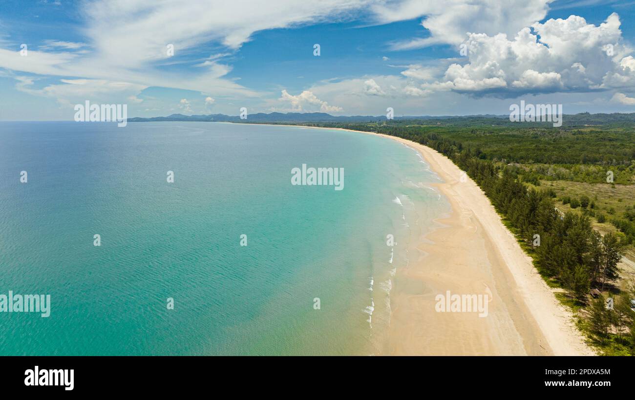 Seascape with tropical sandy beach and blue ocean. Borneo, Malaysia ...