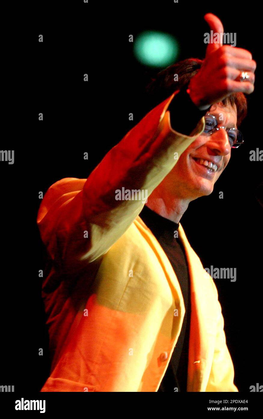 Robin Gibb gives the audience a thumbs up during his concert Tuesday ...