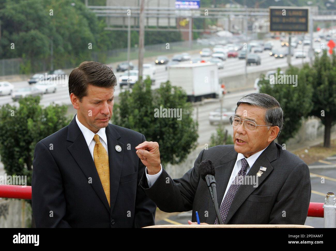 U.S. Secretary of Transportation Norman Y. Mineta, right, and National ...