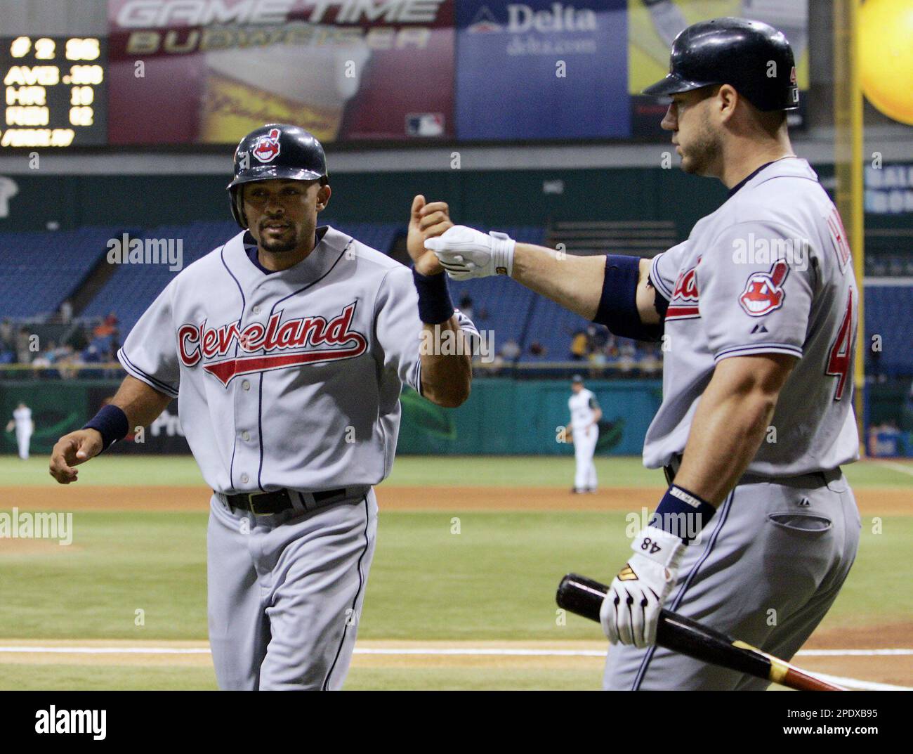 Cleveland Indians' Coco Crisp, left, gets a high five from teammate ...