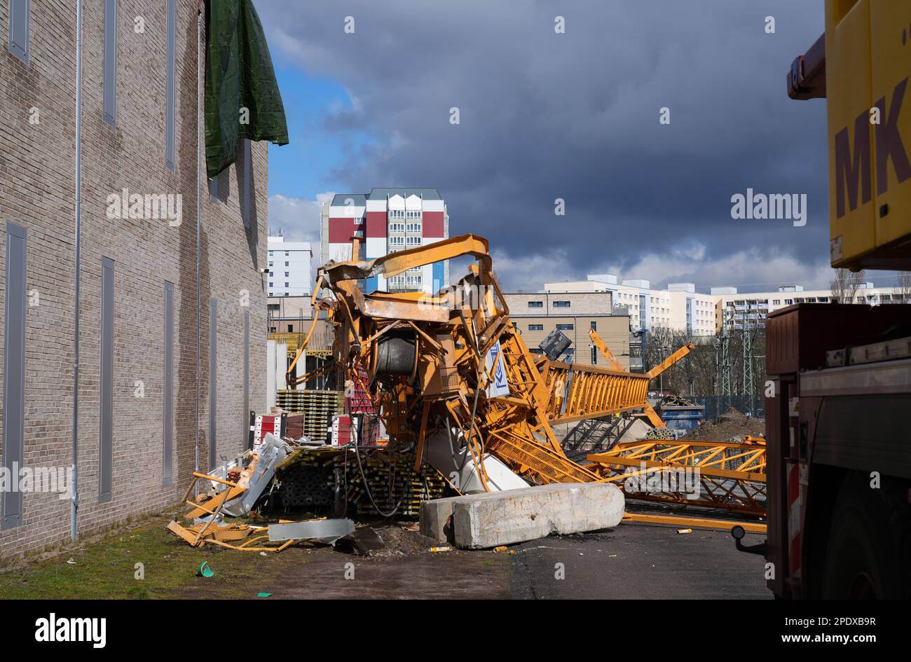 Potsdam, Germany. 15th Mar, 2023. A fallen construction crane lies on ...