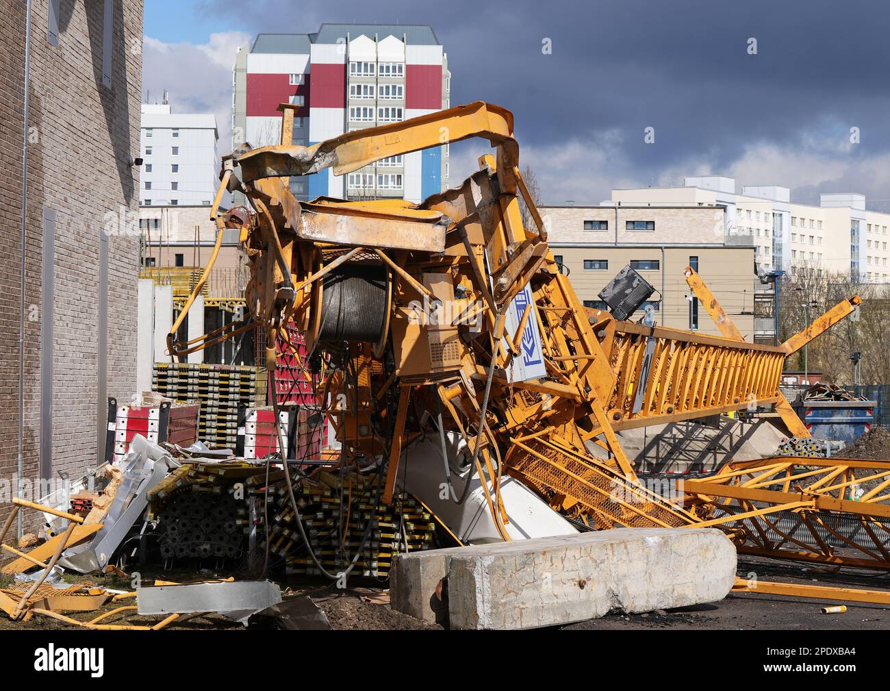 Potsdam, Germany. 15th Mar, 2023. A fallen construction crane lies on ...