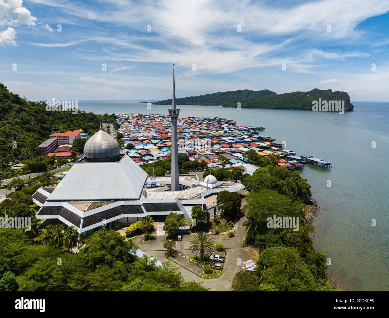 Mosque and village on the water in the city of Sandakan. Sabah, Borneo ...