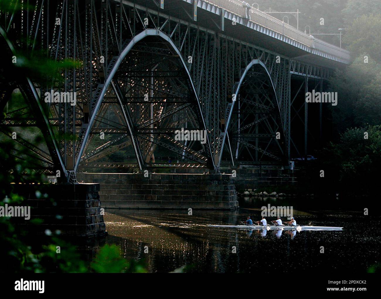 Rowers make their way under the Strawberry Mansion Bridge while heading ...
