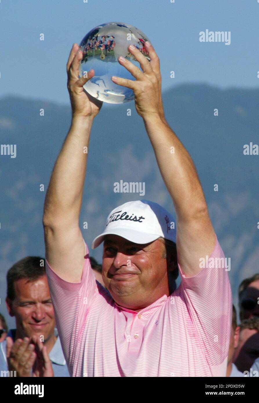 David Eger holds the trophy aloft after winning the Boeing Greater ...