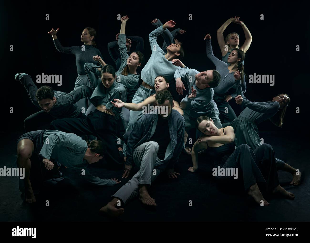 Diversity, chaos and freedom. Group of young people dancing contemp ...