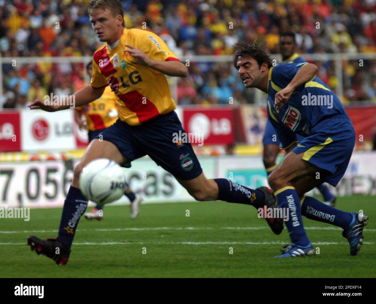 America soccer player Claudio Lopez , right, from Argentina, fights for ...