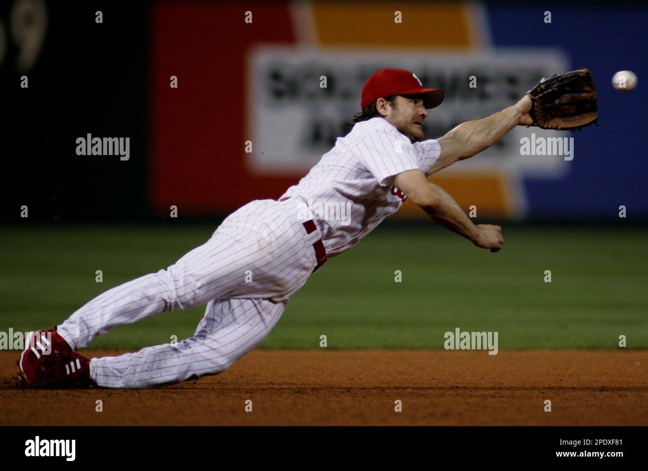 Philadelphia Phillies third baseman David Bell can't make the catch on ...