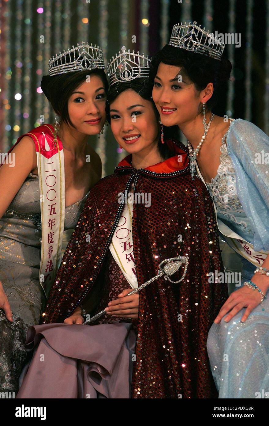 Miss Hong Kong winner Tracy Ip Chui Chui, center, poses with first ...