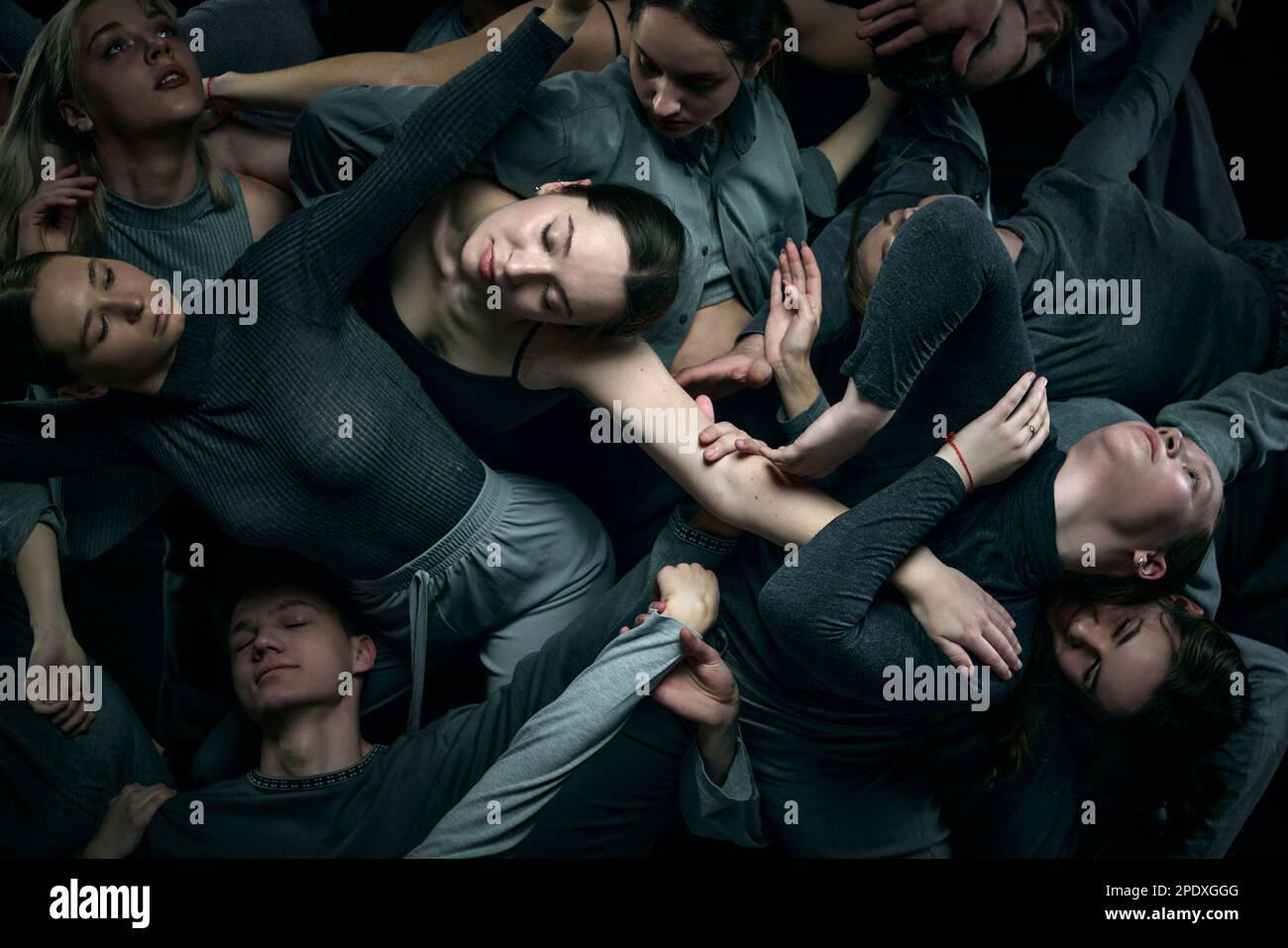 Close-up image of young people making impressive dance performance ...