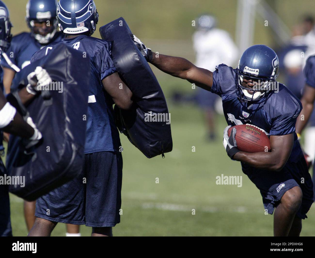 Seattle Seahawks running back Maurice Morris, right, stiff arms a ...